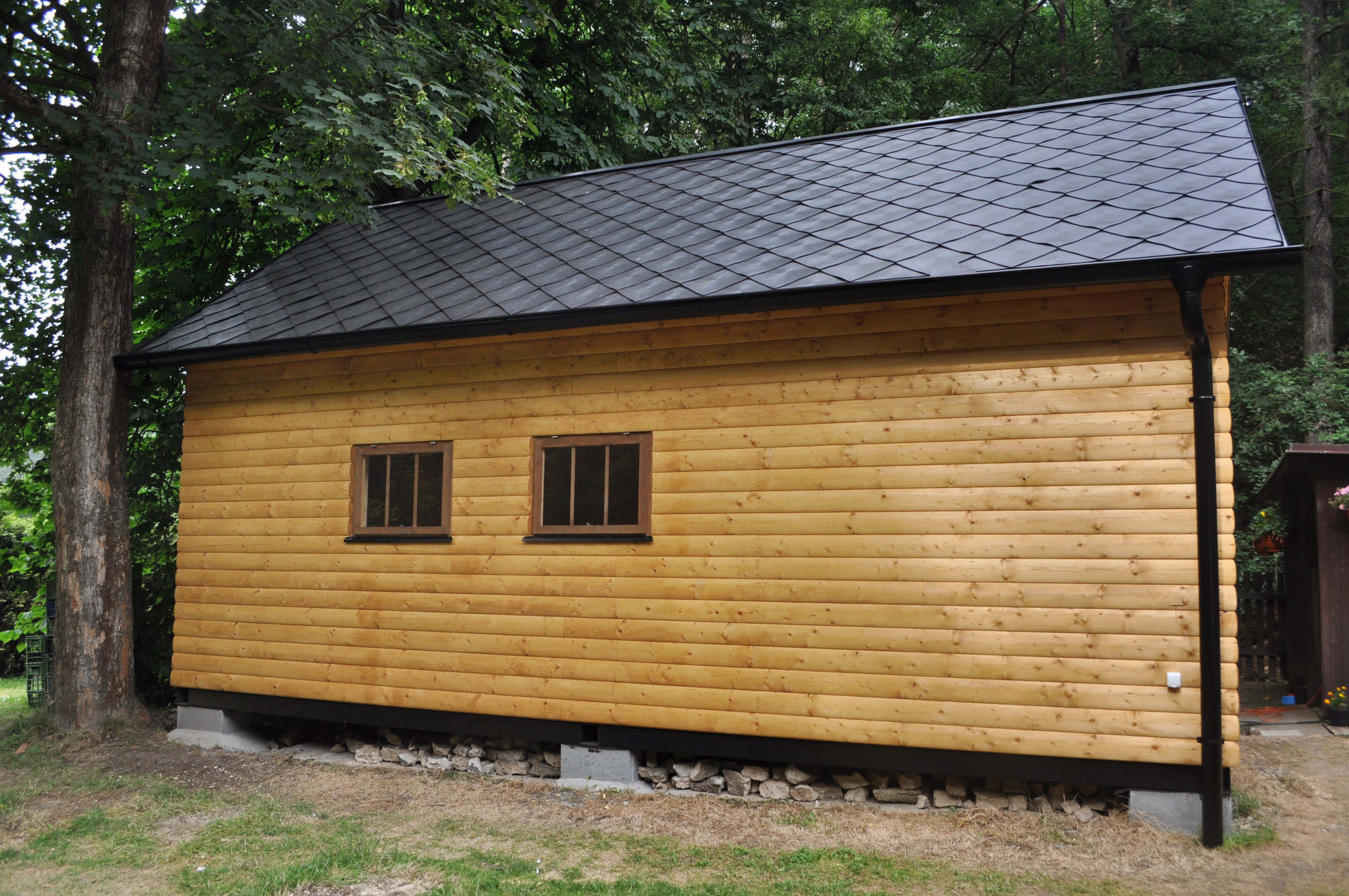 Dřevěné chaty na klíč - BRICKHOMES Plzeň